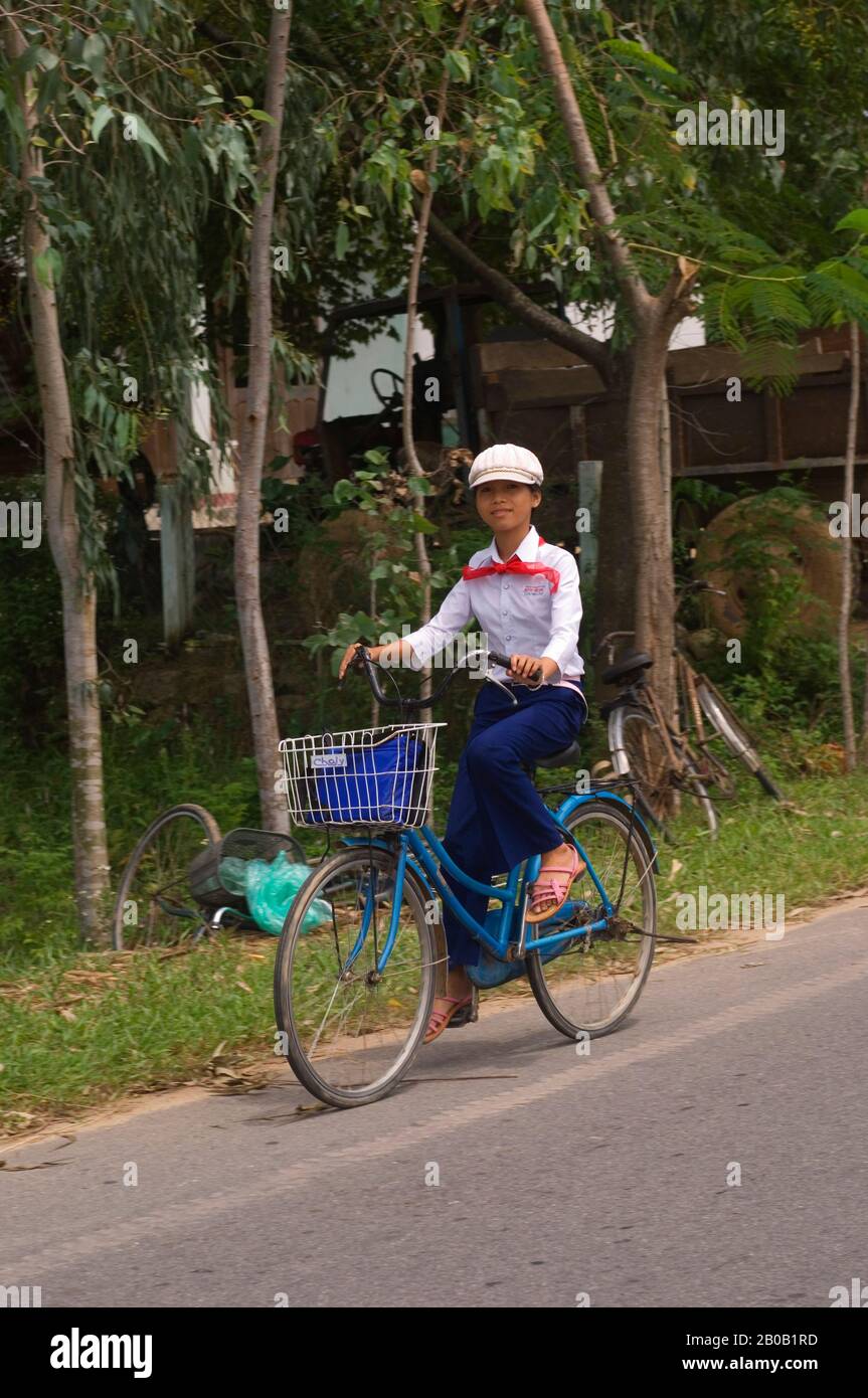 VIETNAM, NEAR DA NANG, SCHOOLGIRL ON BICYCLE COMING FROM SCHOOL Stock ...