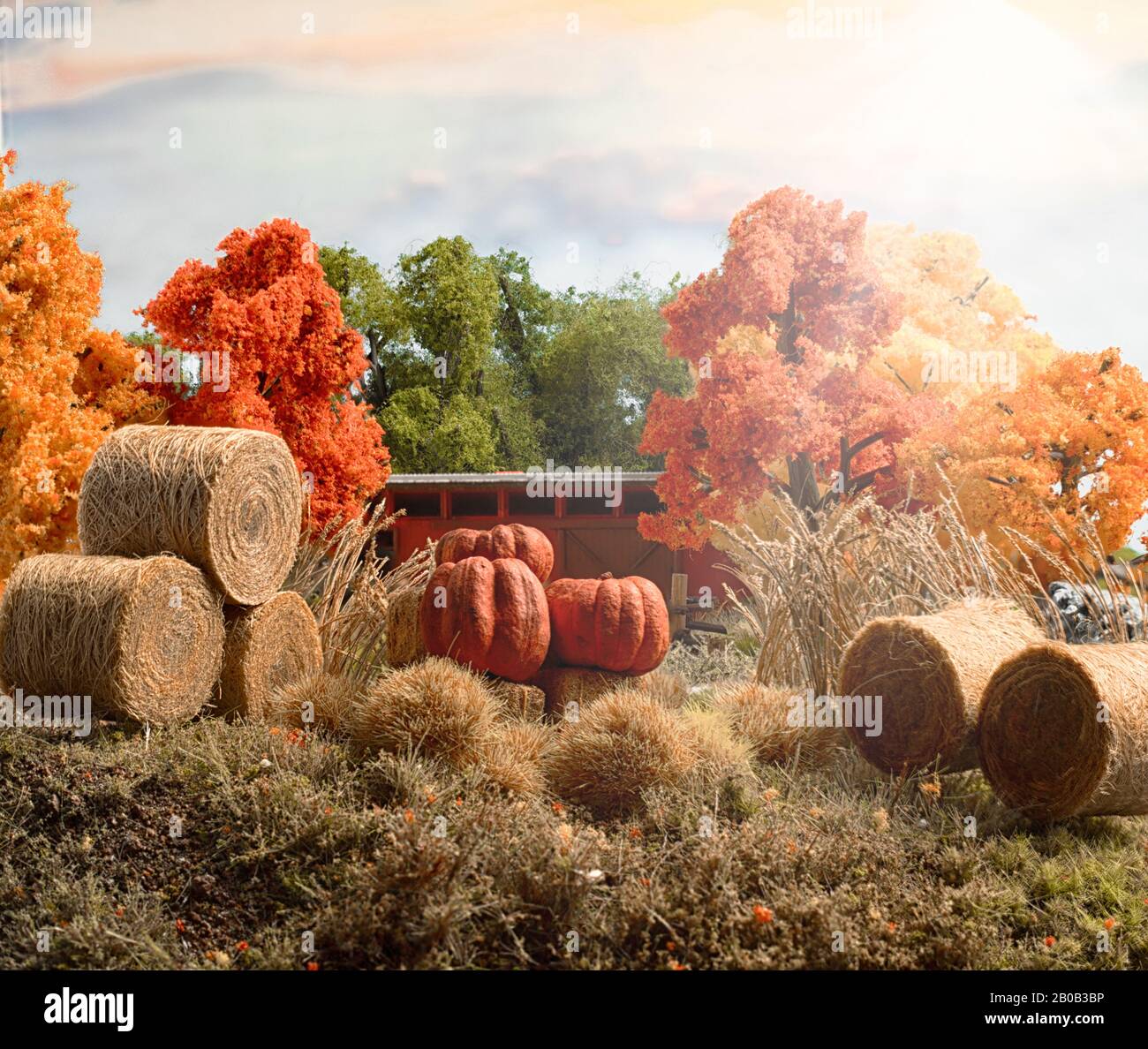 Fall Pumpkins on Hay Stack Stock Photo - Alamy