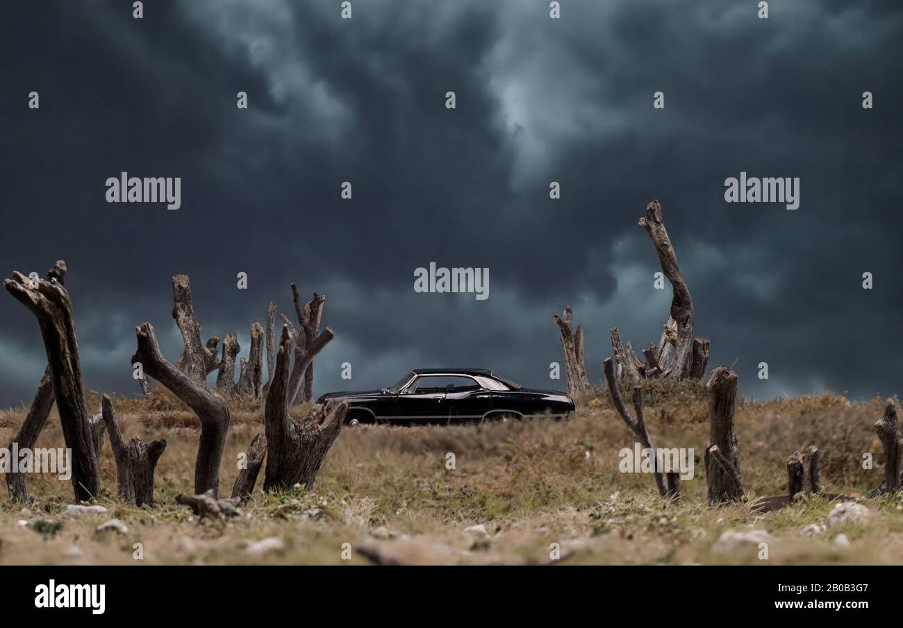 Car Driving Along Dark, Ominous Path Stock Photo - Alamy