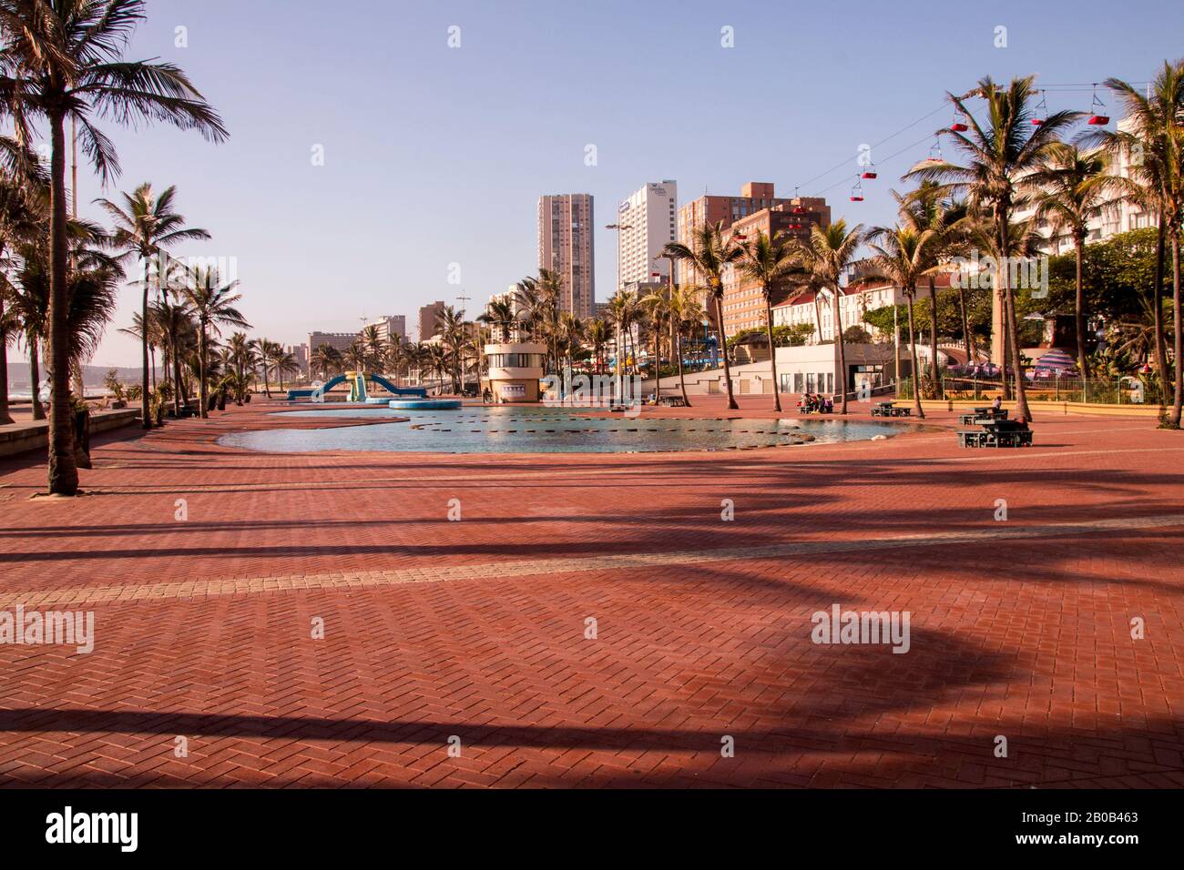 Paddling pools on Durban's golden mile lined with palm trees and hotels ...