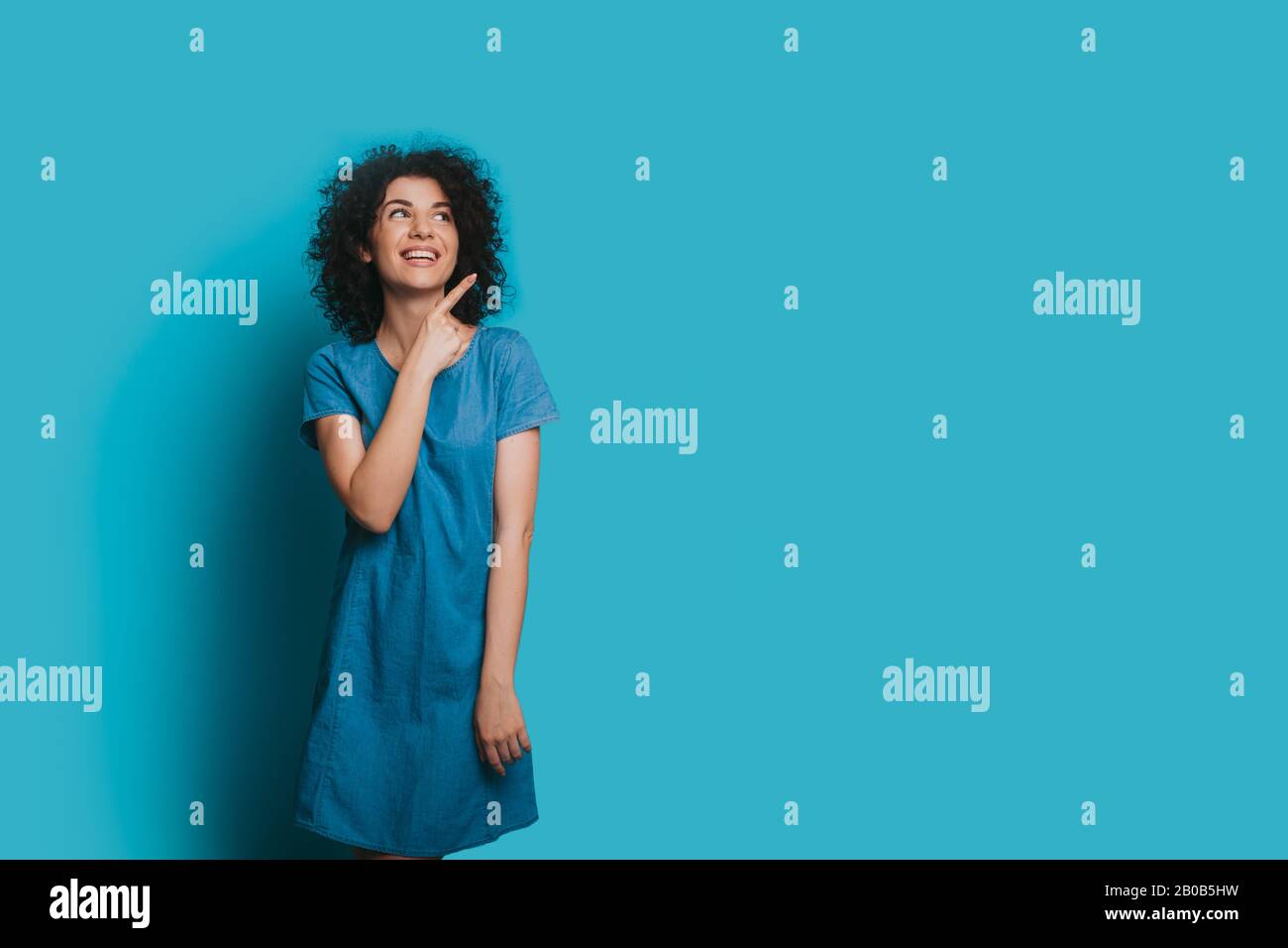 Blue one arm dress hi-res stock photography and images - Alamy