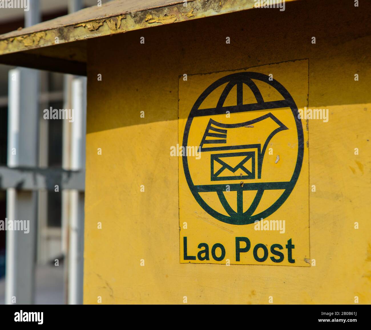 Vientiane, Laos - Jan 29, 2020. Old yellow letter box at downtown in ...
