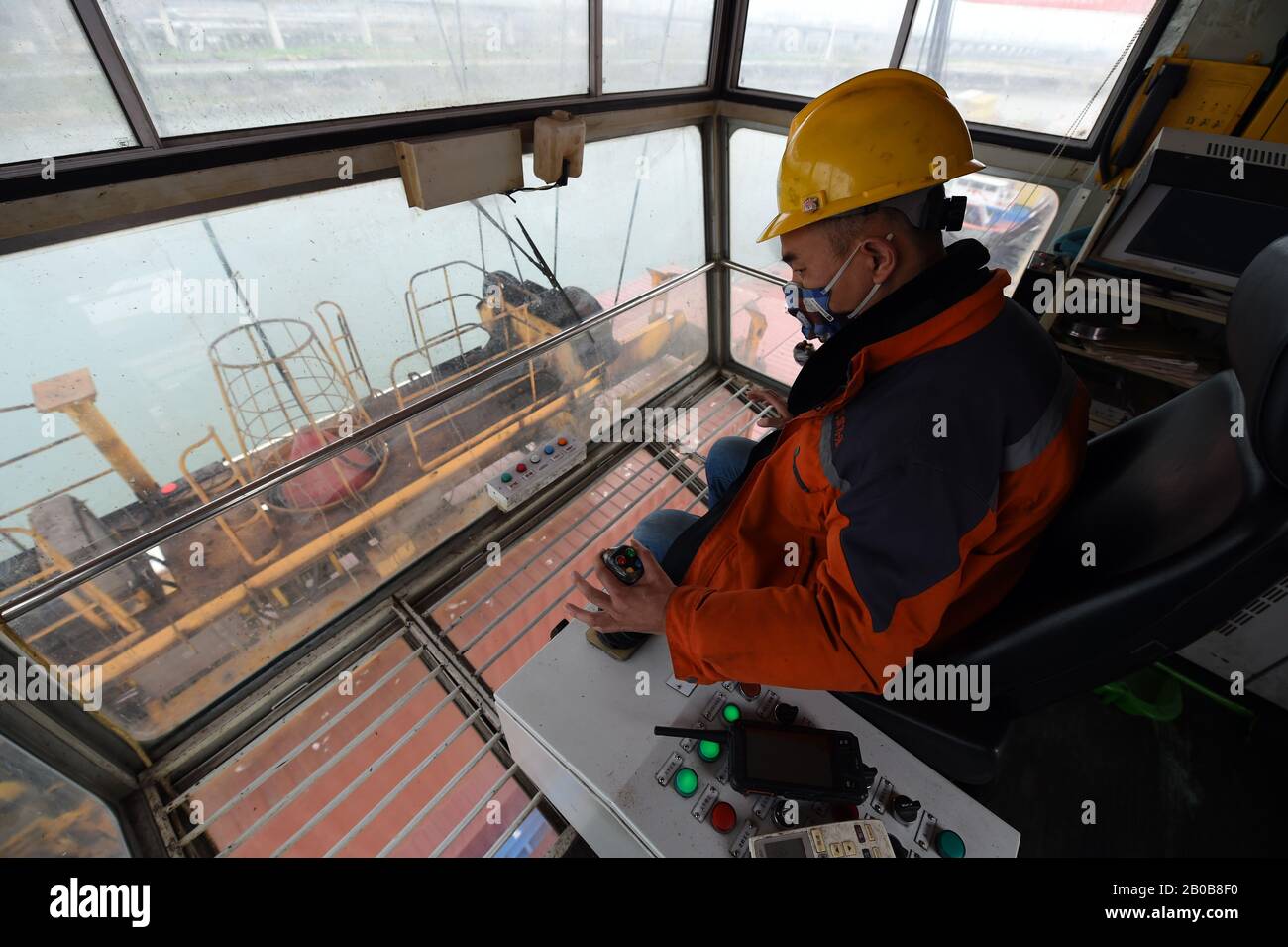 Hefei, China's Anhui Province. 19th Feb, 2020. A worker operates a ...