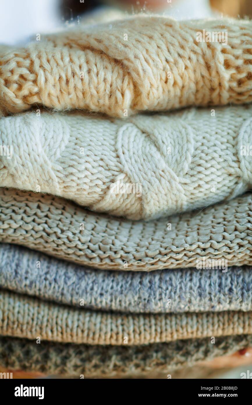 Closeup on pile of sweaters Stock Photo - Alamy
