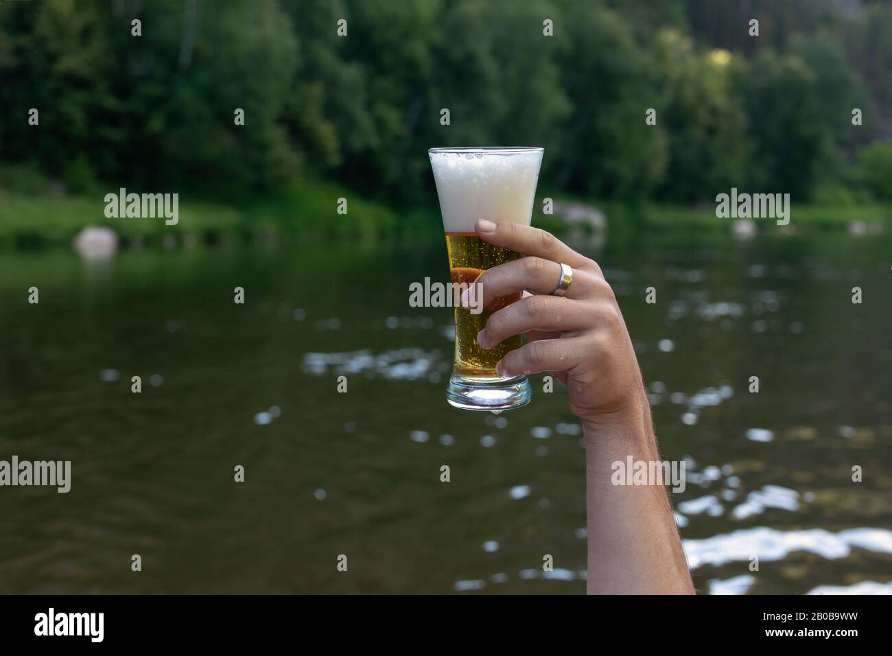 Raise beer glass hi-res stock photography and images - Alamy