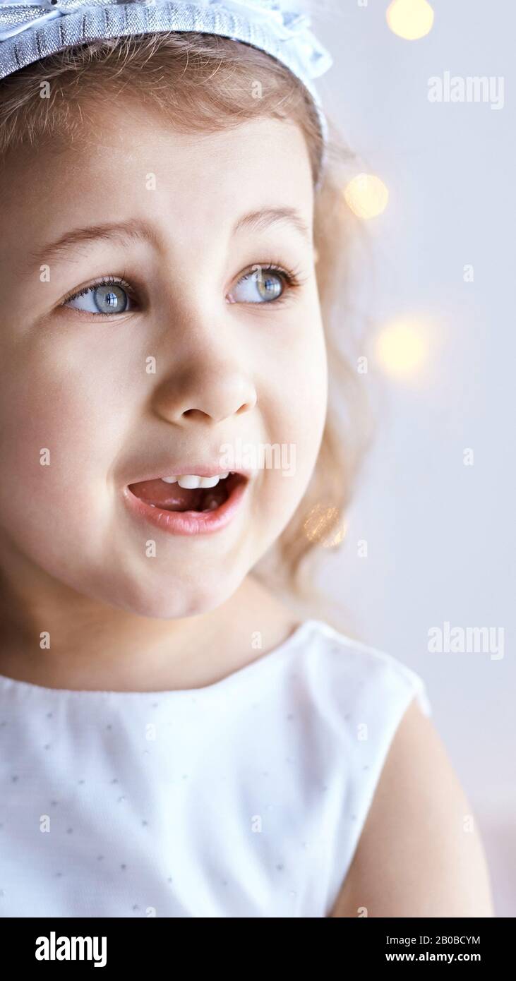 Happy amazed female kid emotion. Suprised child studio portrait. Young ...