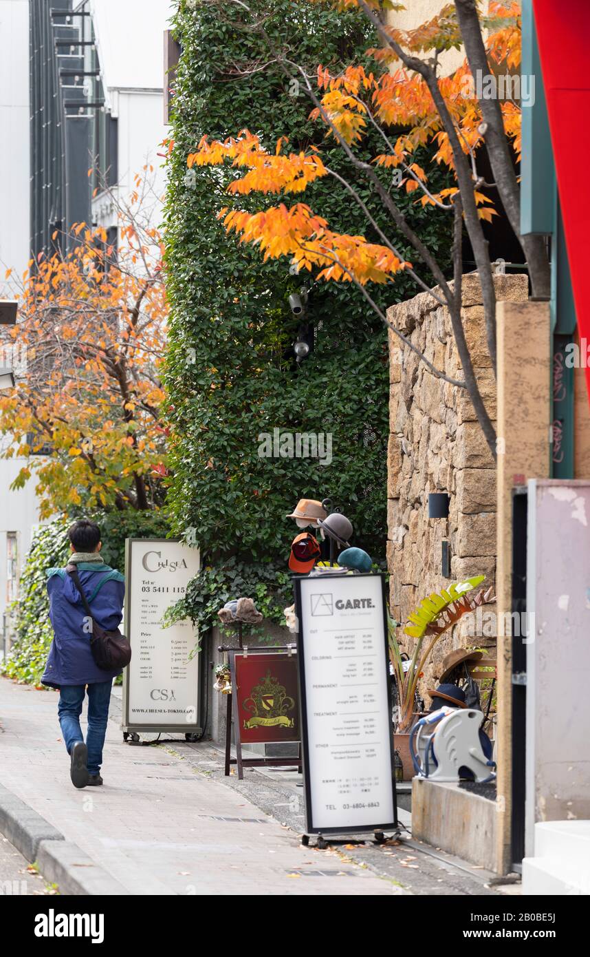 Man walking past shops, Harajuku, Tokyo, Japan Stock Photo - Alamy
