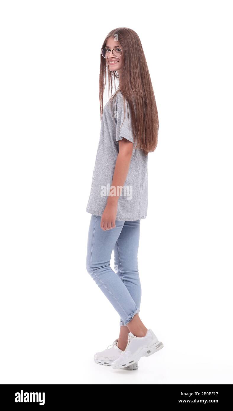 side view. smiling young woman looking at the camera Stock Photo - Alamy