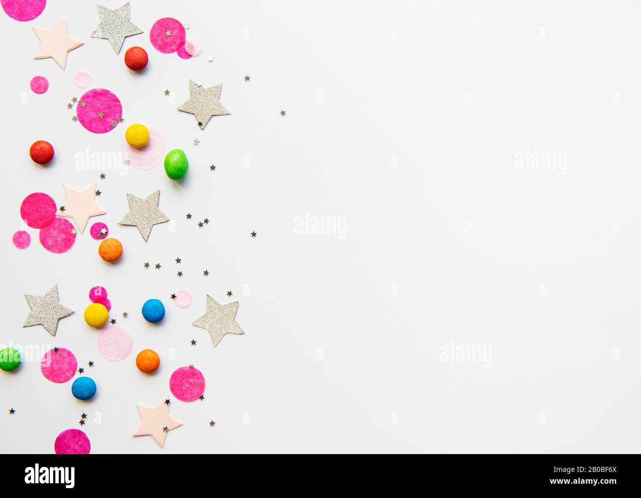 Happy birthday concept, confetti and multicolored candy on a white ...