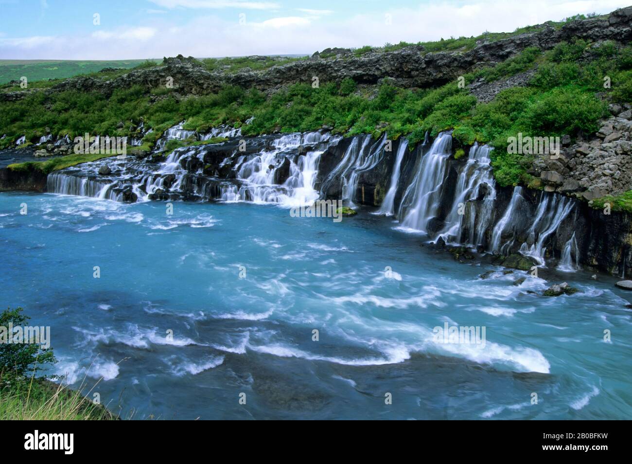 ICELAND, NORTHWESTERN INTERIOR, VIEW OF HRAUNFOSSAR, LAVA WATERFALL ...