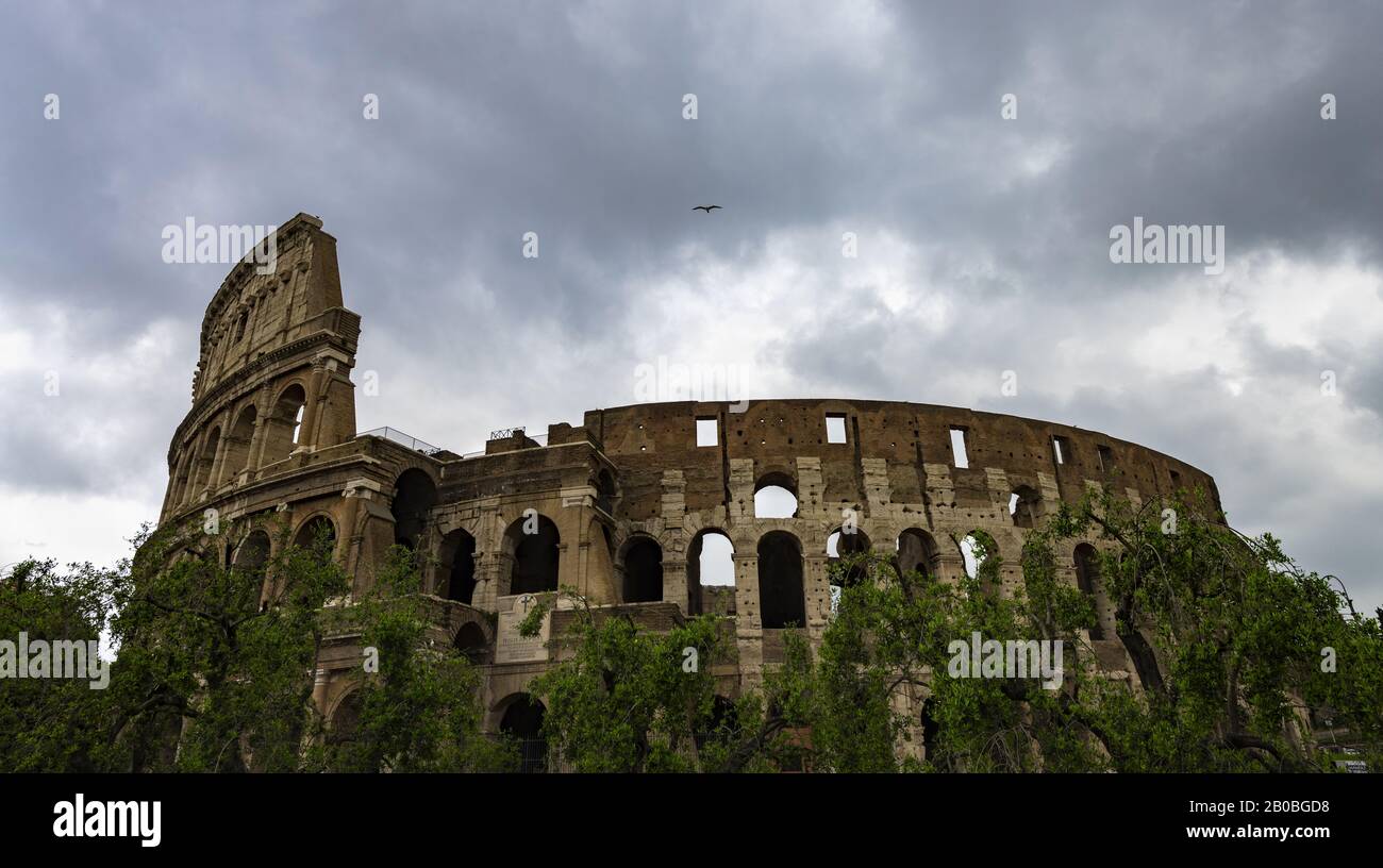 Heavy clouds over Colosseum in Rome Stock Photo - Alamy