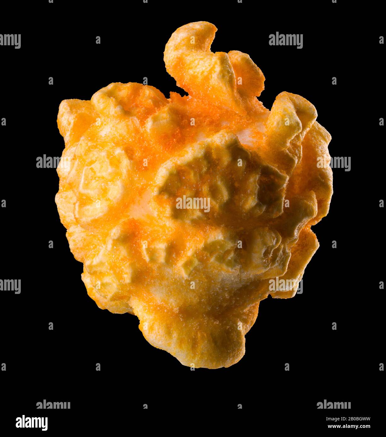Single popped popcorn on a black background with clipping path Stock ...