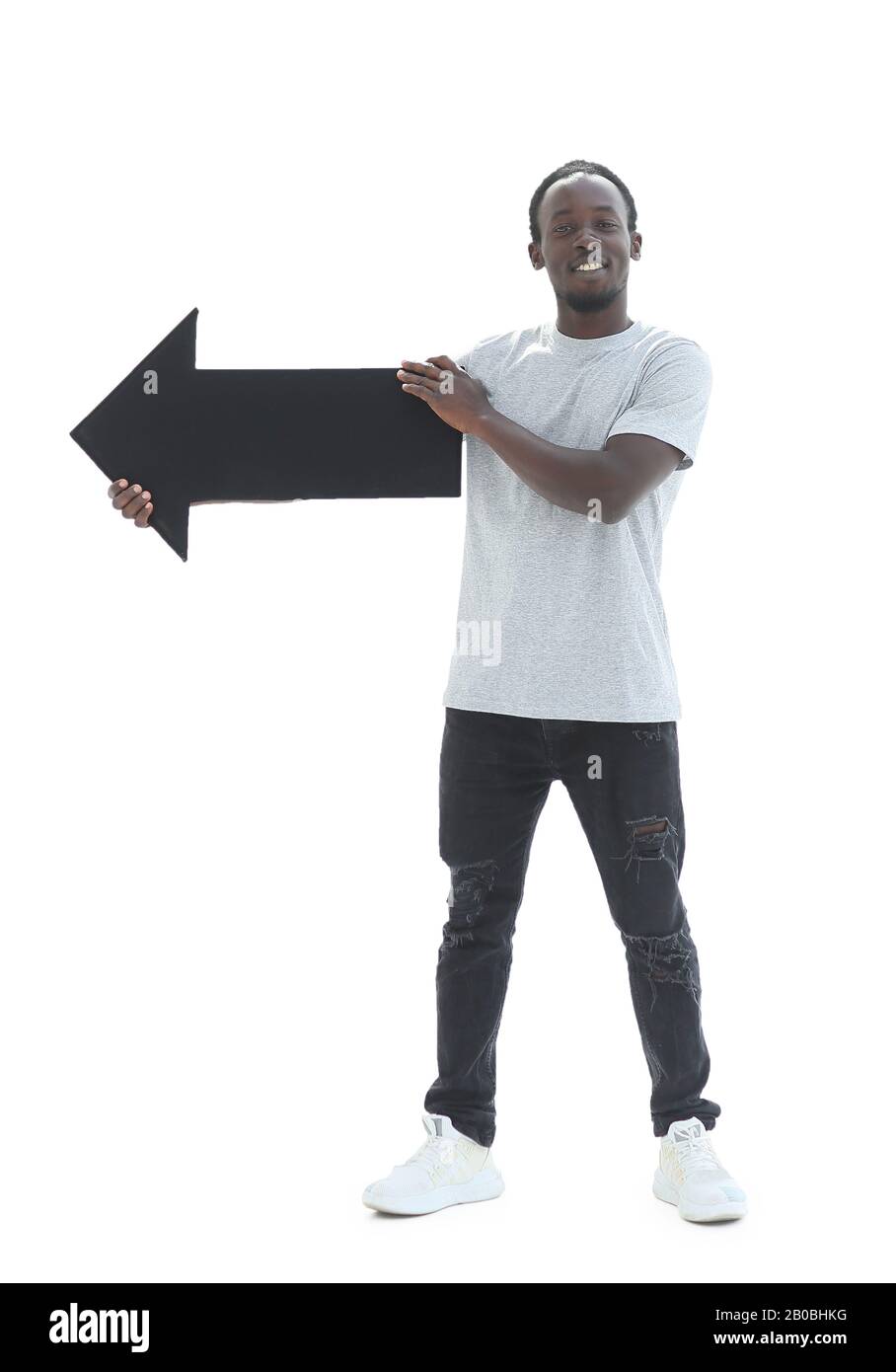 in full growth. casual guy pointing in the right direction Stock Photo ...