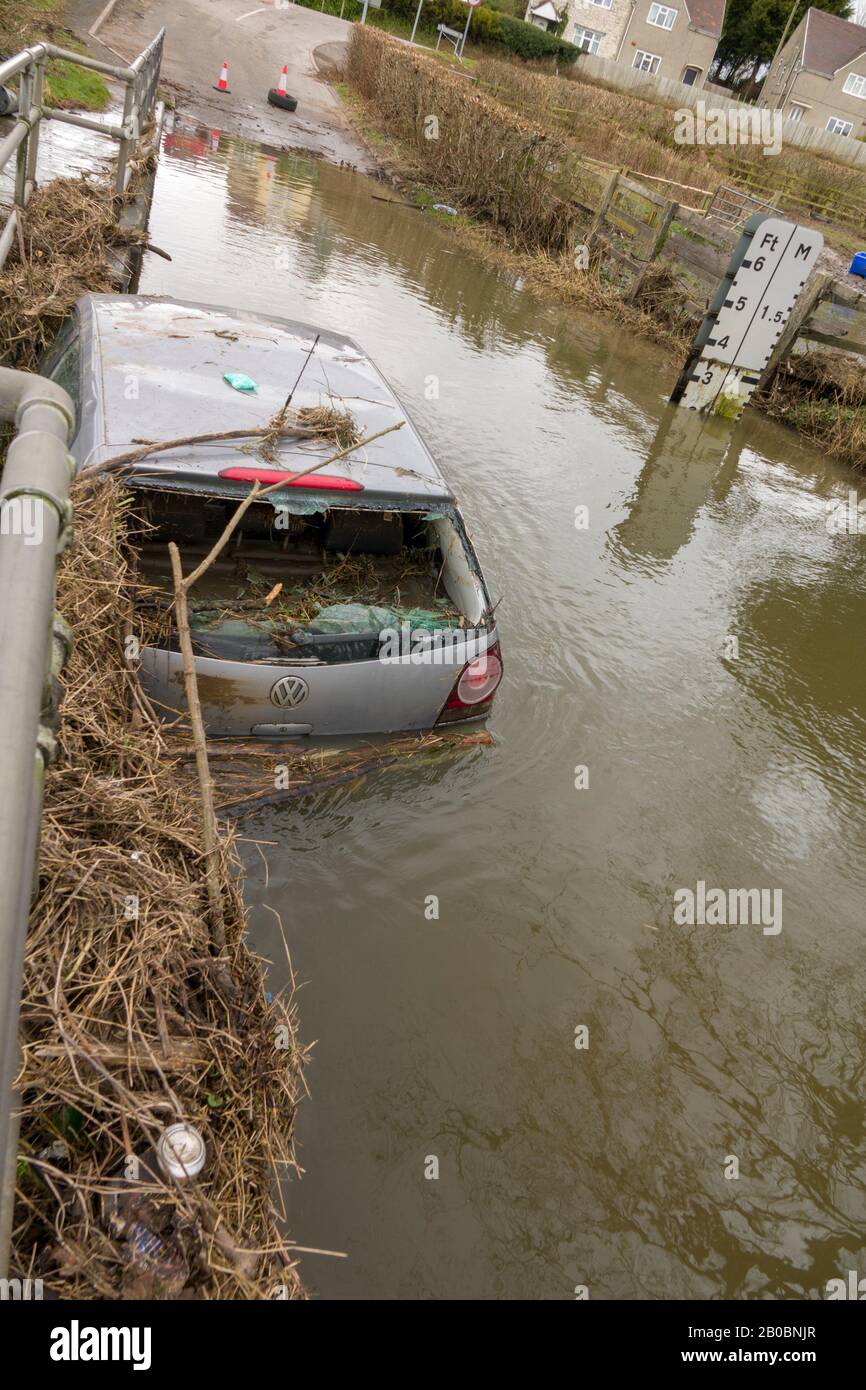 Car stuck in Ford after storm Dennis, flooded Trescott ford Stock Photo ...