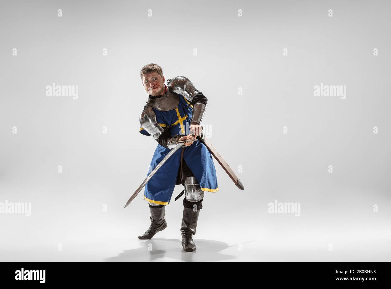 Brave armored knight with professional weapon fighting isolated on ...