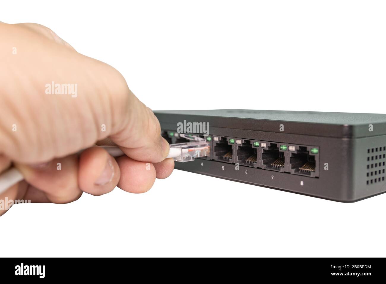 Hand of man holding The blue network cables connect port switch on ...