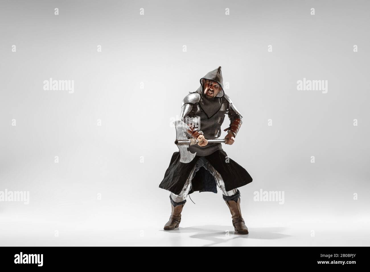 Brave armored knight with professional weapon fighting isolated on ...