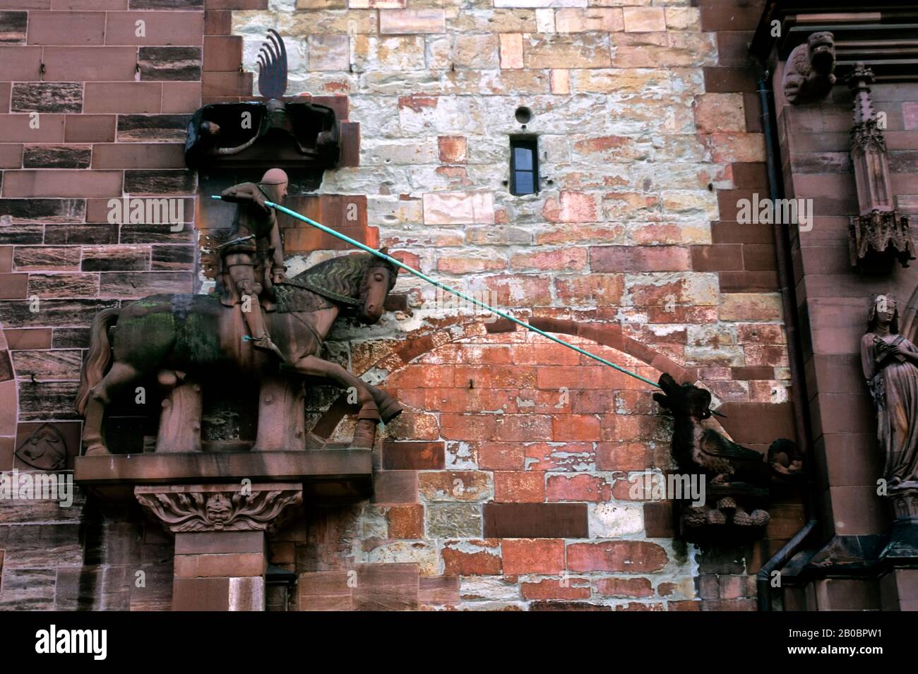 SWITZERLAND, BASEL, CATHEDRAL (MUNSTER), STATUE OF ST. GEORGE KILLING ...