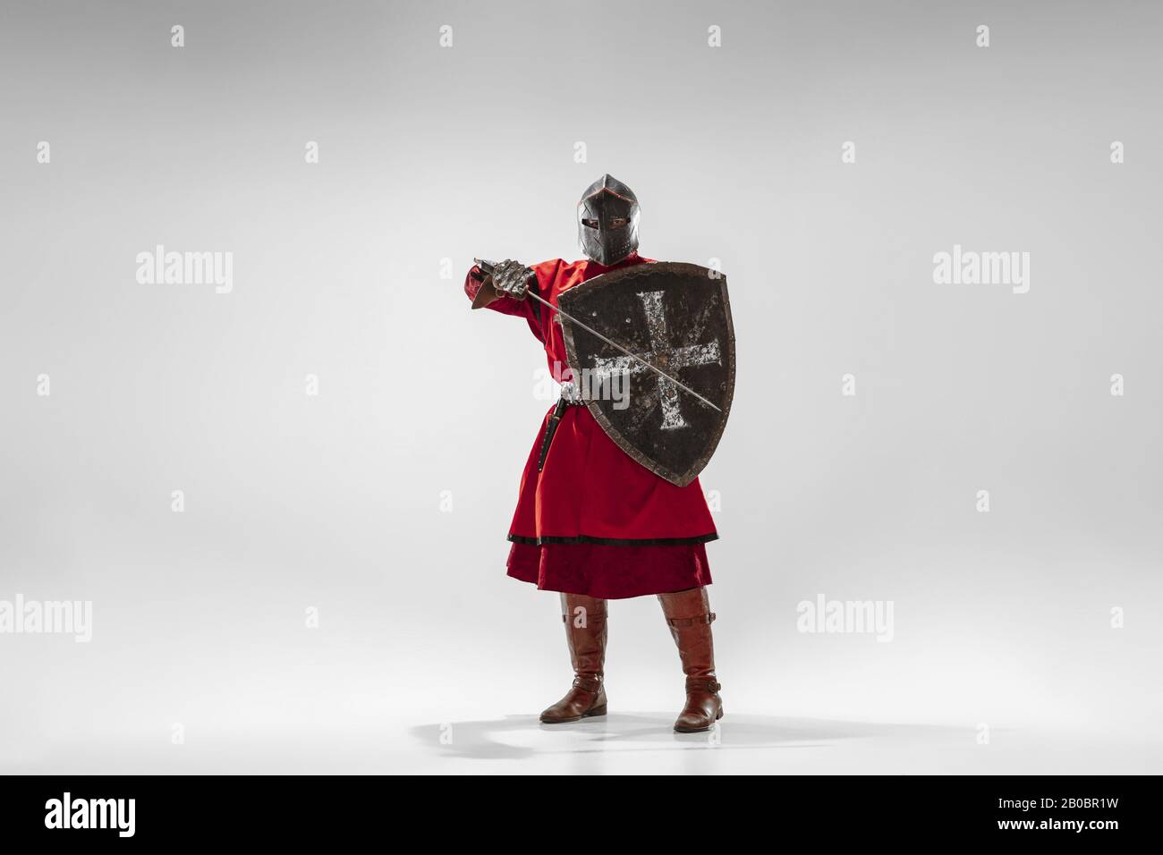 Brave armored knight with professional weapon fighting isolated on ...
