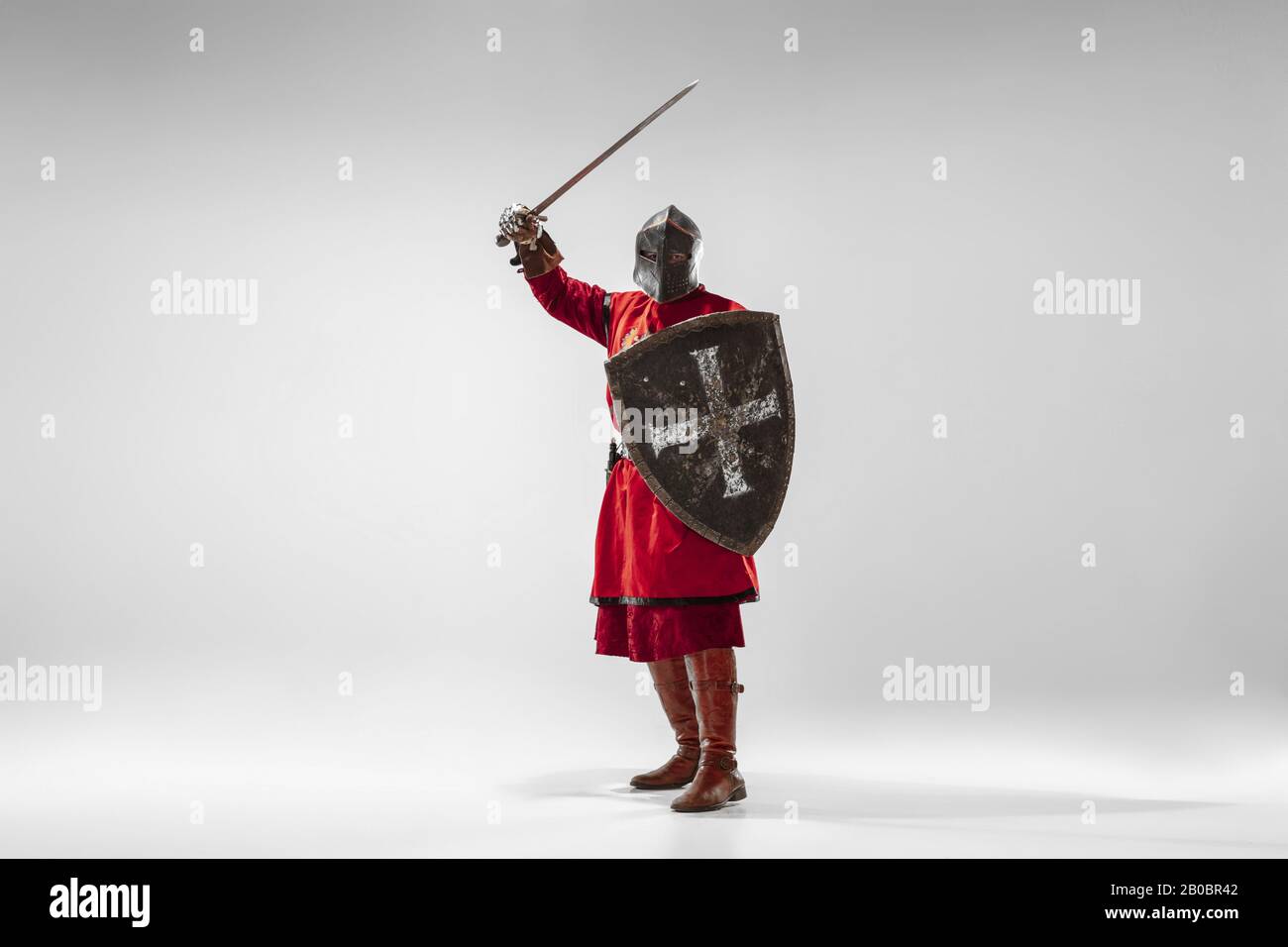 Brave armored knight with professional weapon fighting isolated on ...