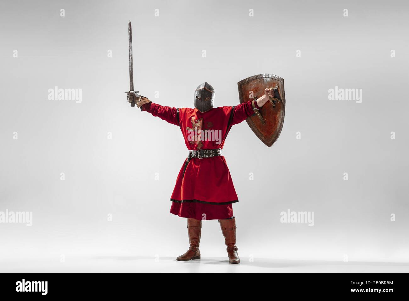 Brave armored knight with professional weapon fighting isolated on ...