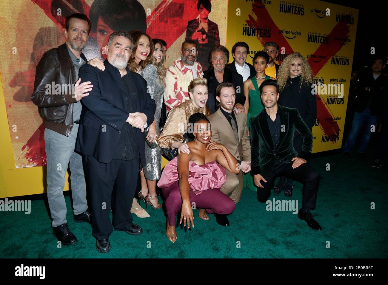 Los Angeles, USA. 19th Feb, 2020. Cast and crew of 'Hunters' walking ...