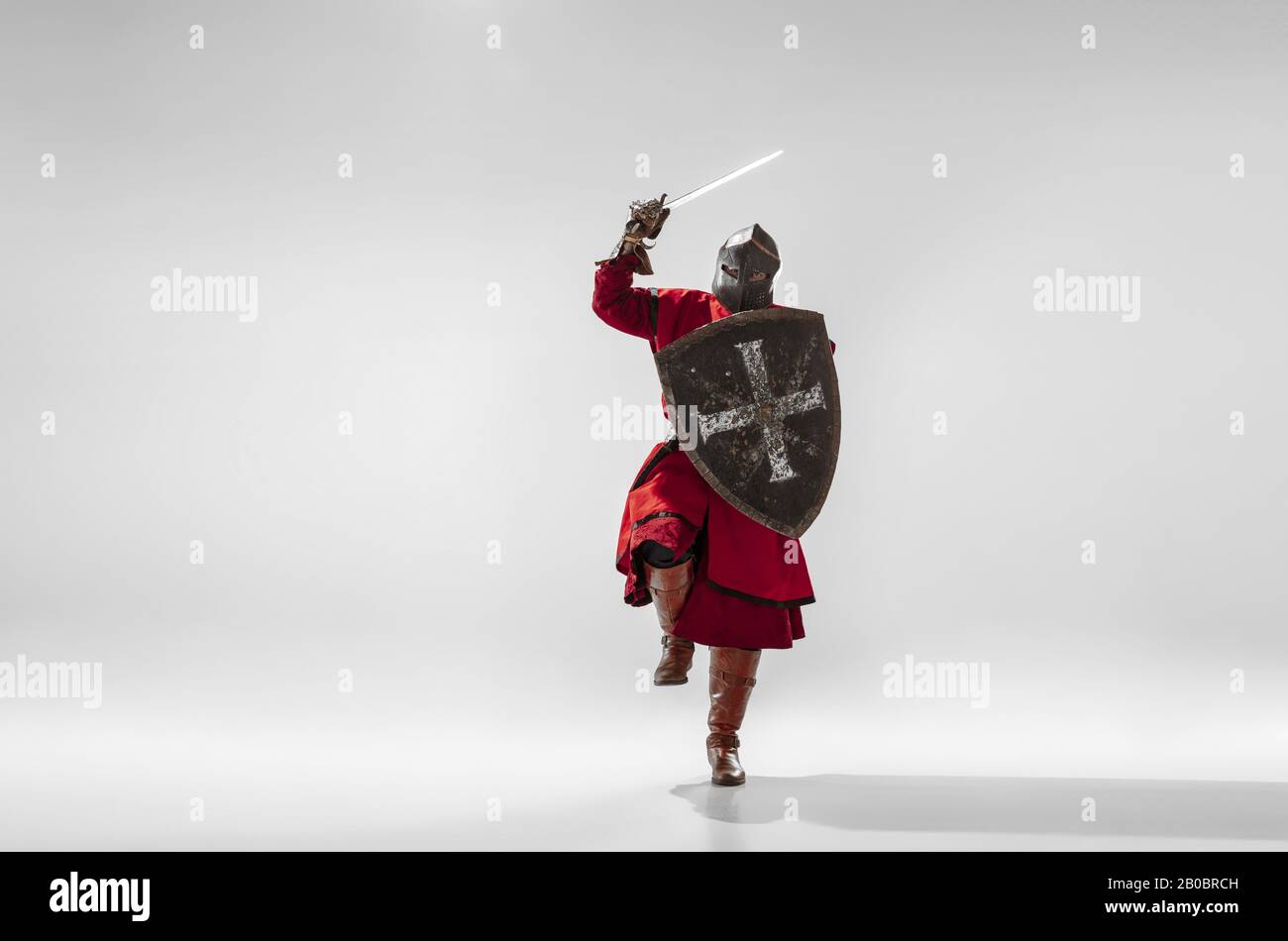 Brave armored knight with professional weapon fighting isolated on ...