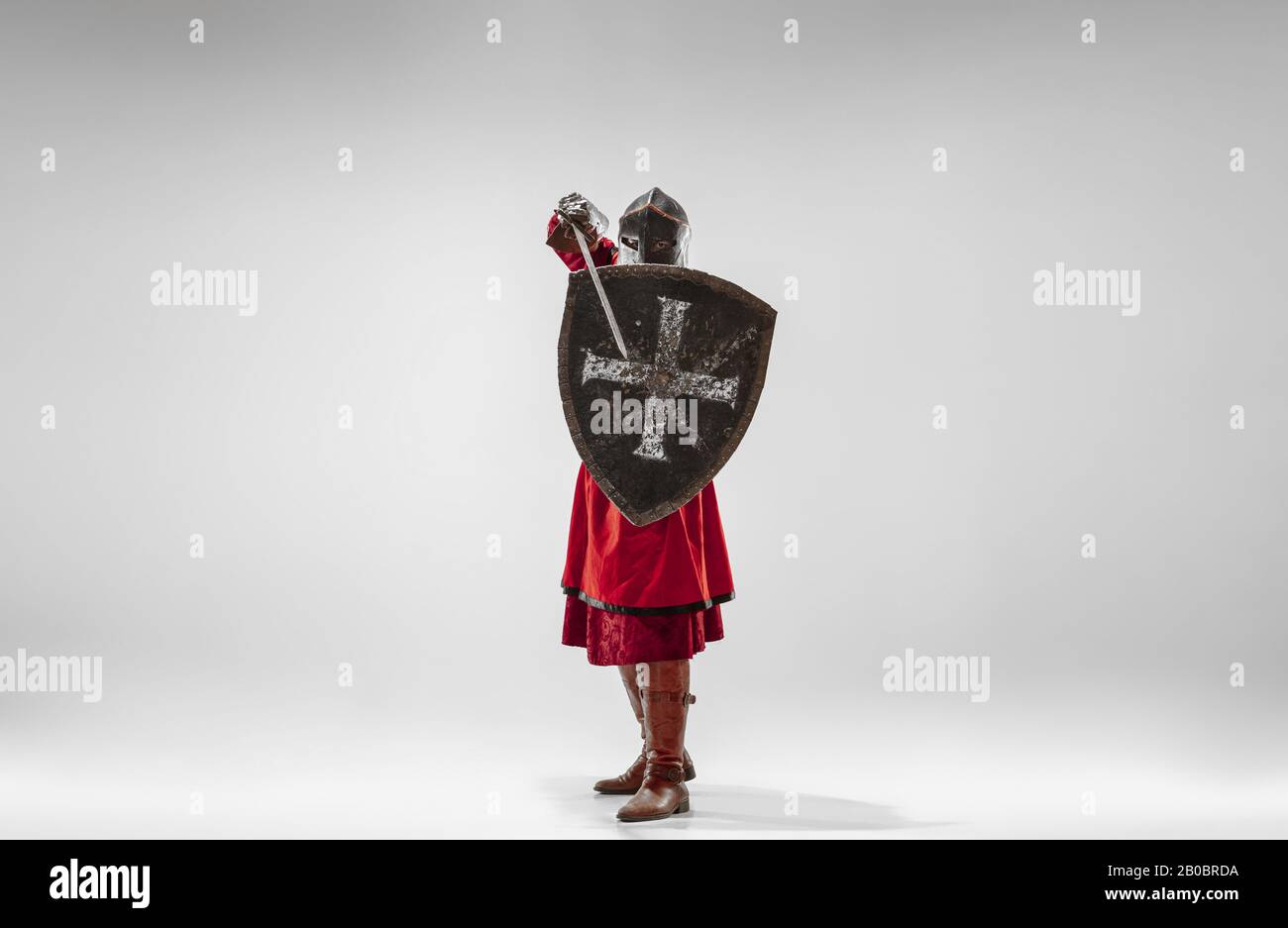 Brave armored knight with professional weapon fighting isolated on ...
