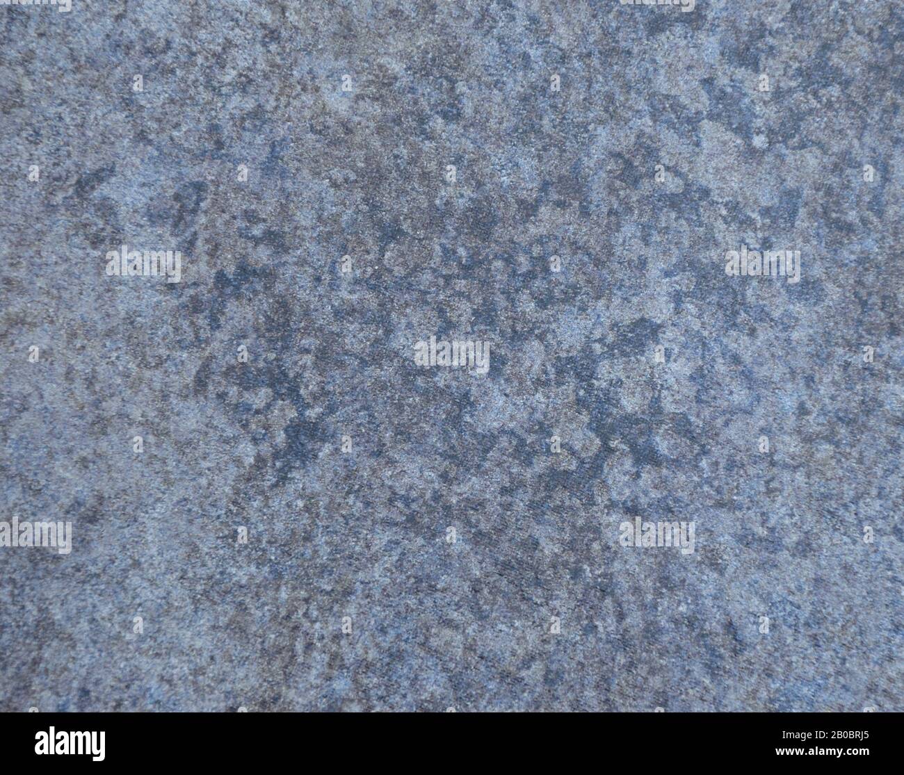 Dark gray granite, polished surface of natural stone close-up ...