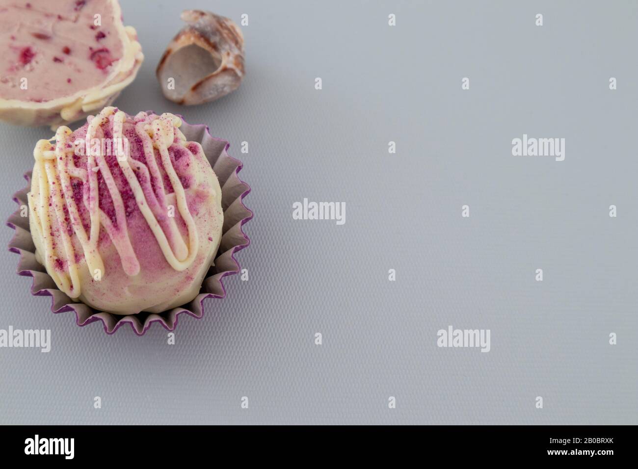 Chocolate candy handmade and homemade on grey background with shell ...