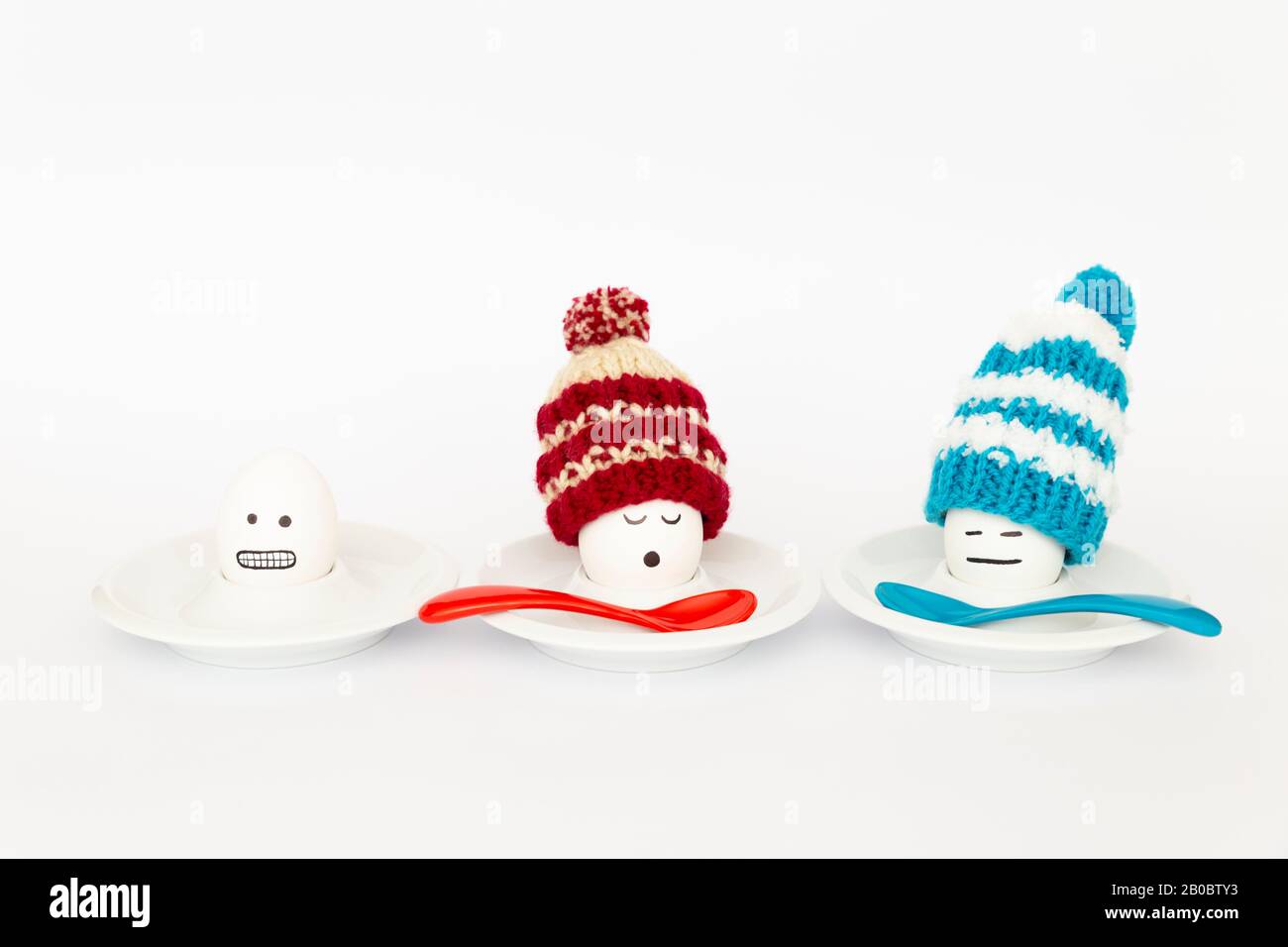 Fun breakfast concept with boiled eggs with abstract happy, sleepy and ...