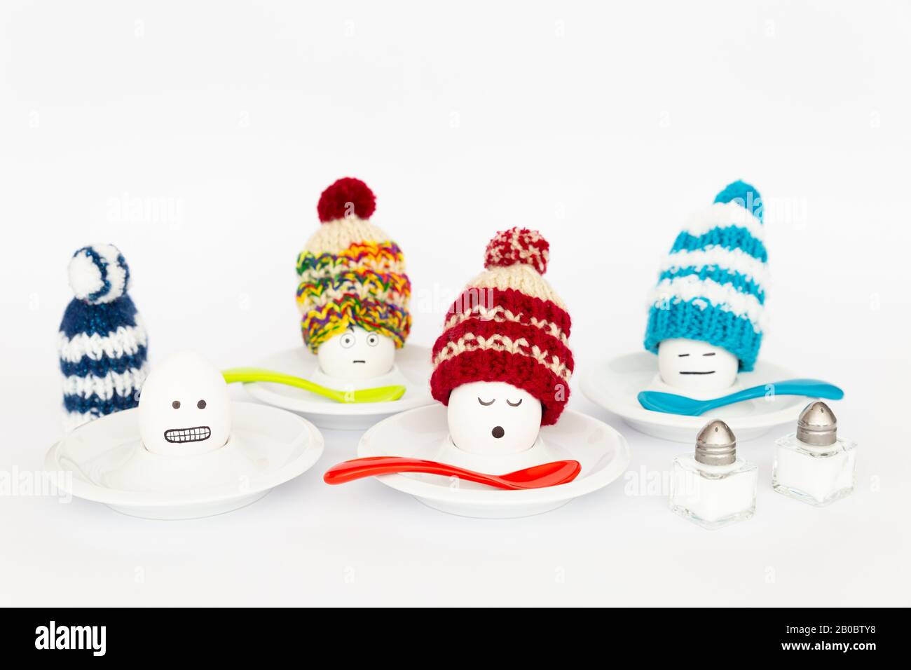 Fun breakfast concept with boiled eggs with abstract happy, sleepy and ...