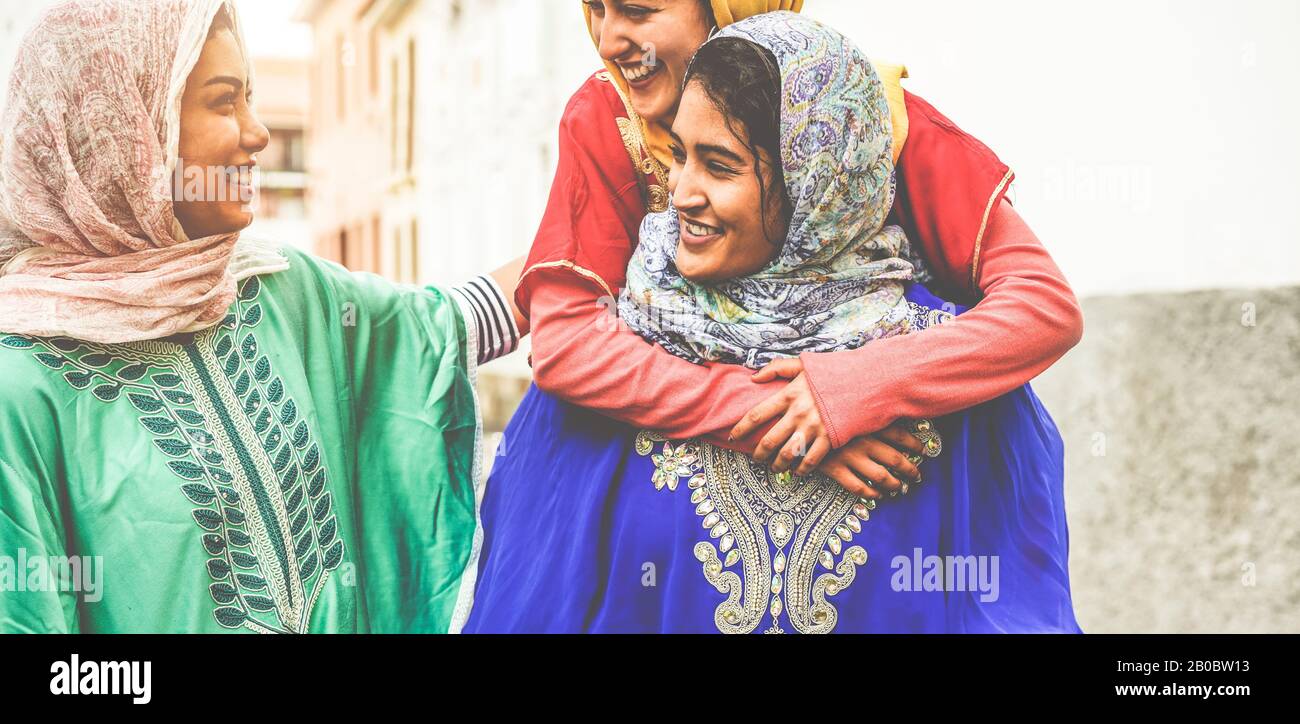 Young islamic friends having fun outdoor - Happy arabian friends ...