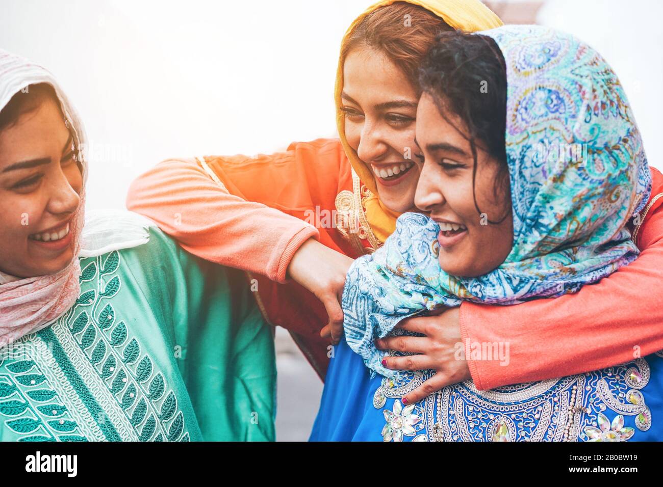 Young islamic friends having fun outdoor - Happy arabian friends ...