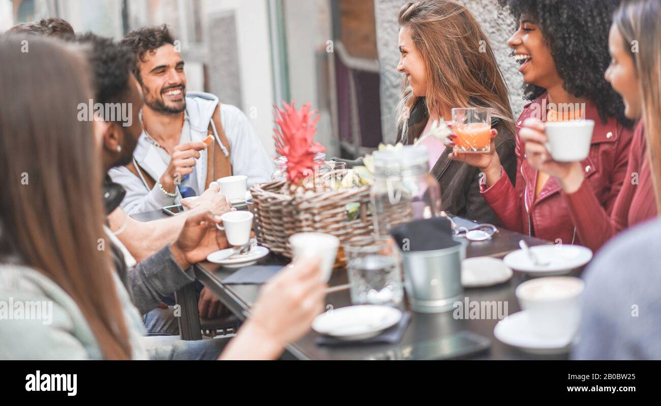 Group of happy friends drinking coffee and cappuccino at vintage bar ...