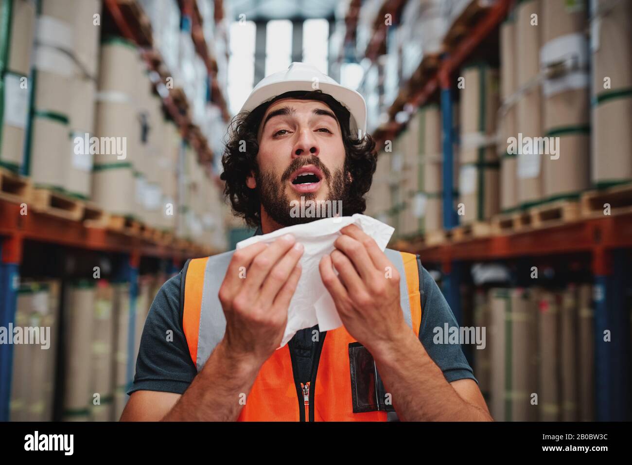 Office worker sneezing hi-res stock photography and images - Alamy