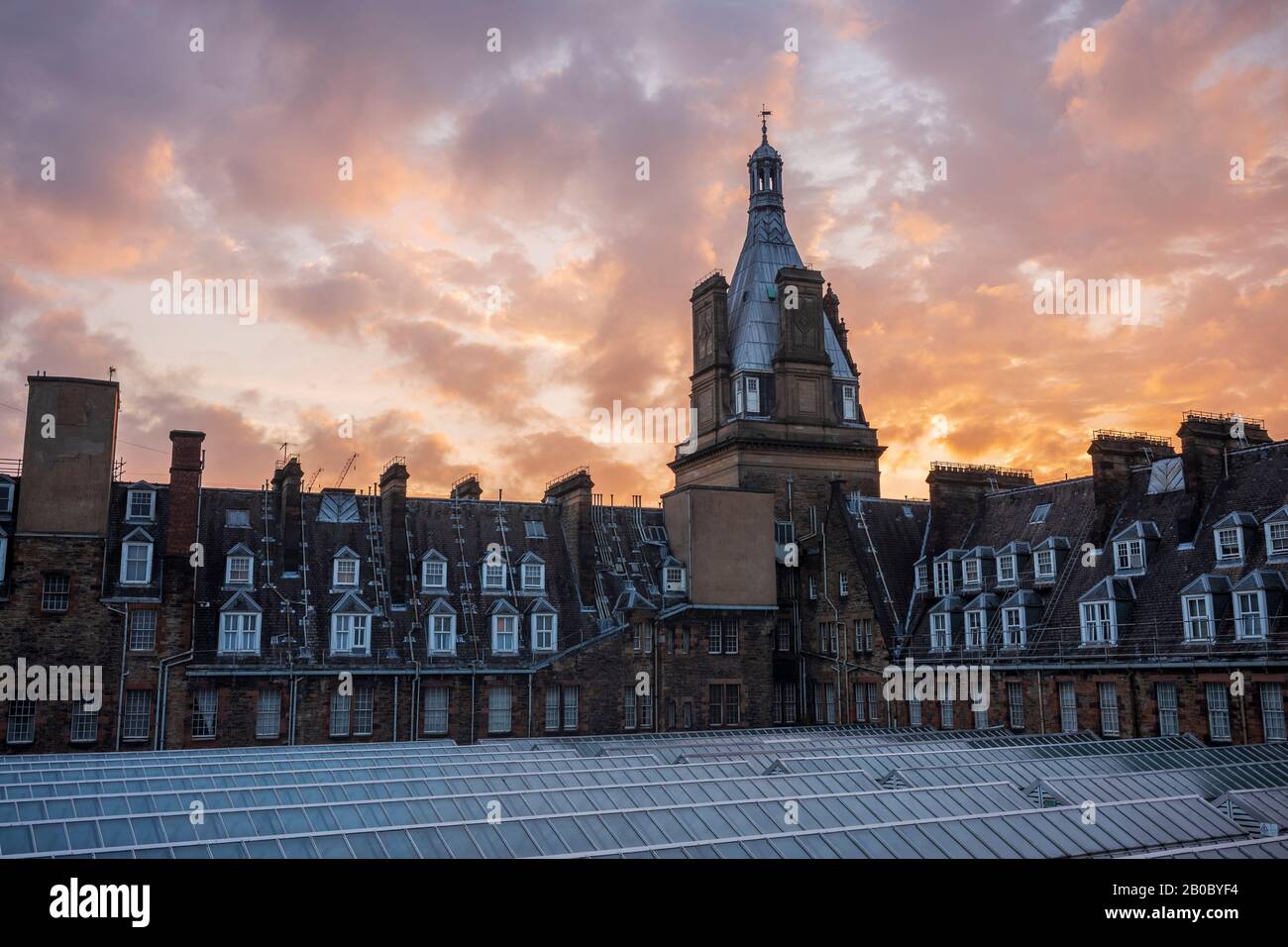 The clouds glow during a sunset near in the Glasgow Central Station in ...