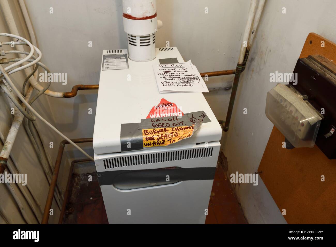 An old domestic floor standing gas boiler in a utility room Stock Photo ...