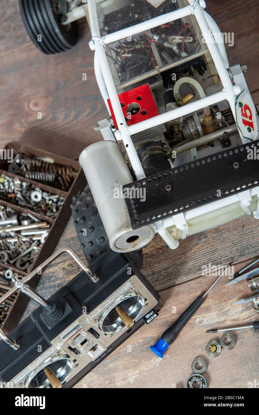 Radio-controlled car model with scattered tools for repairing rc buggy ...
