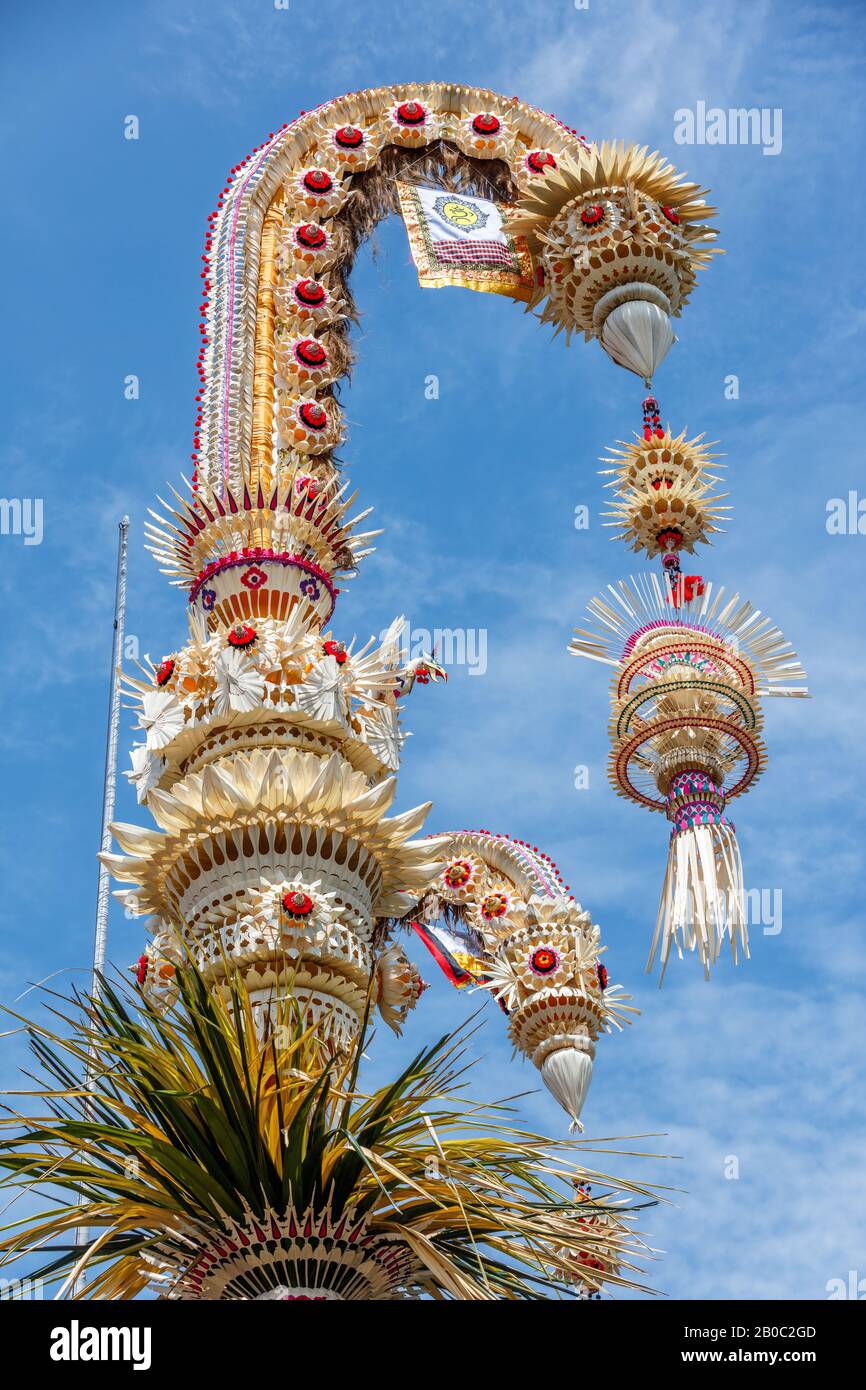 Penjor - street thatched bamboo poles for Galungan celebration of ...