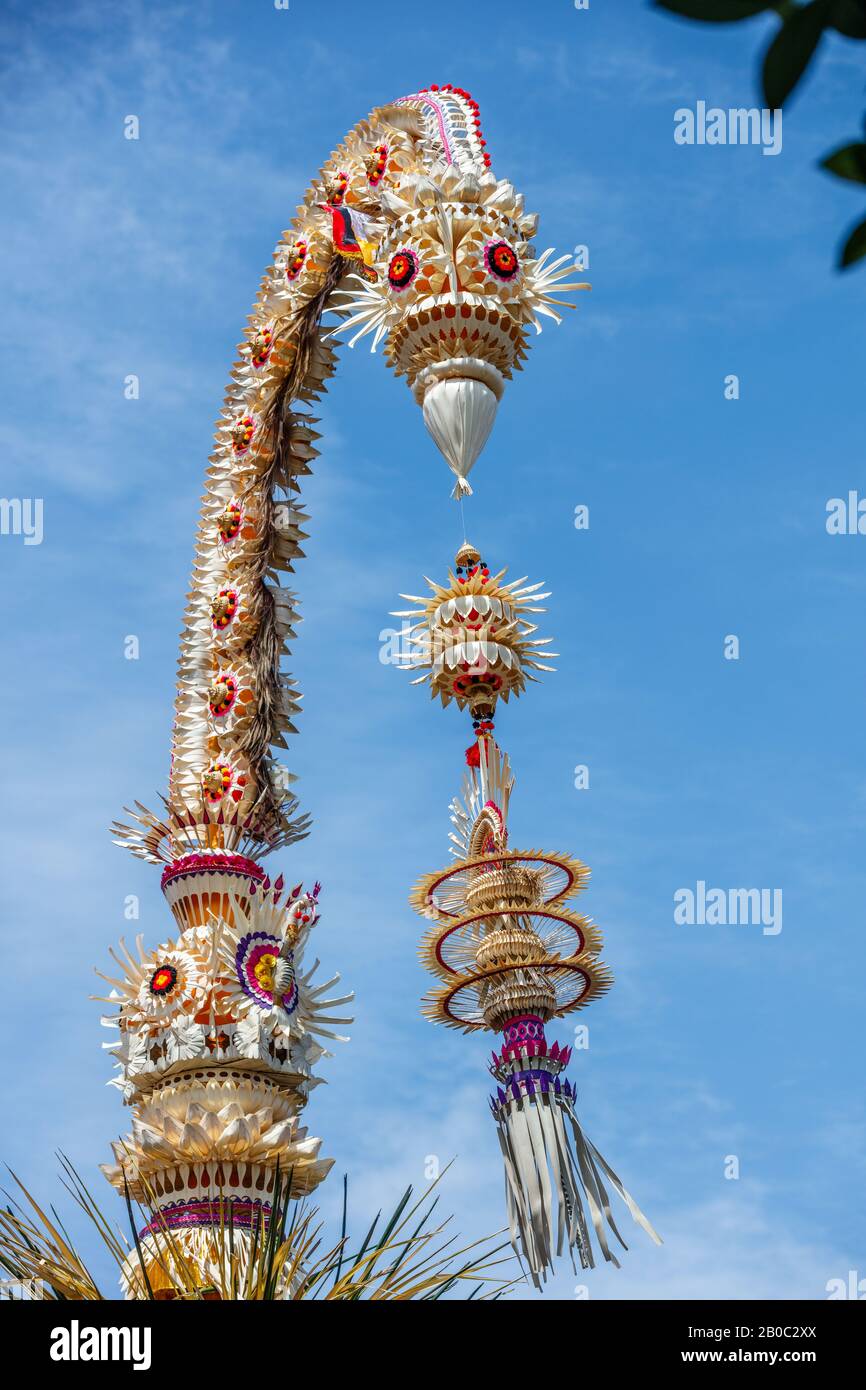 Penjor - street thatched bamboo poles for Galungan celebration of ...