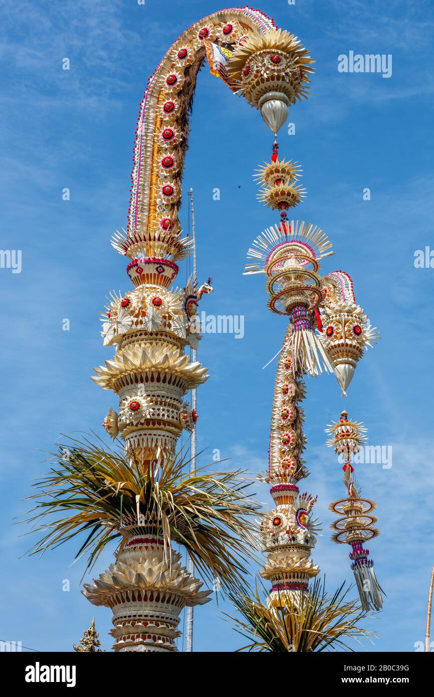 Penjor - street thatched bamboo poles for Galungan celebration of ...