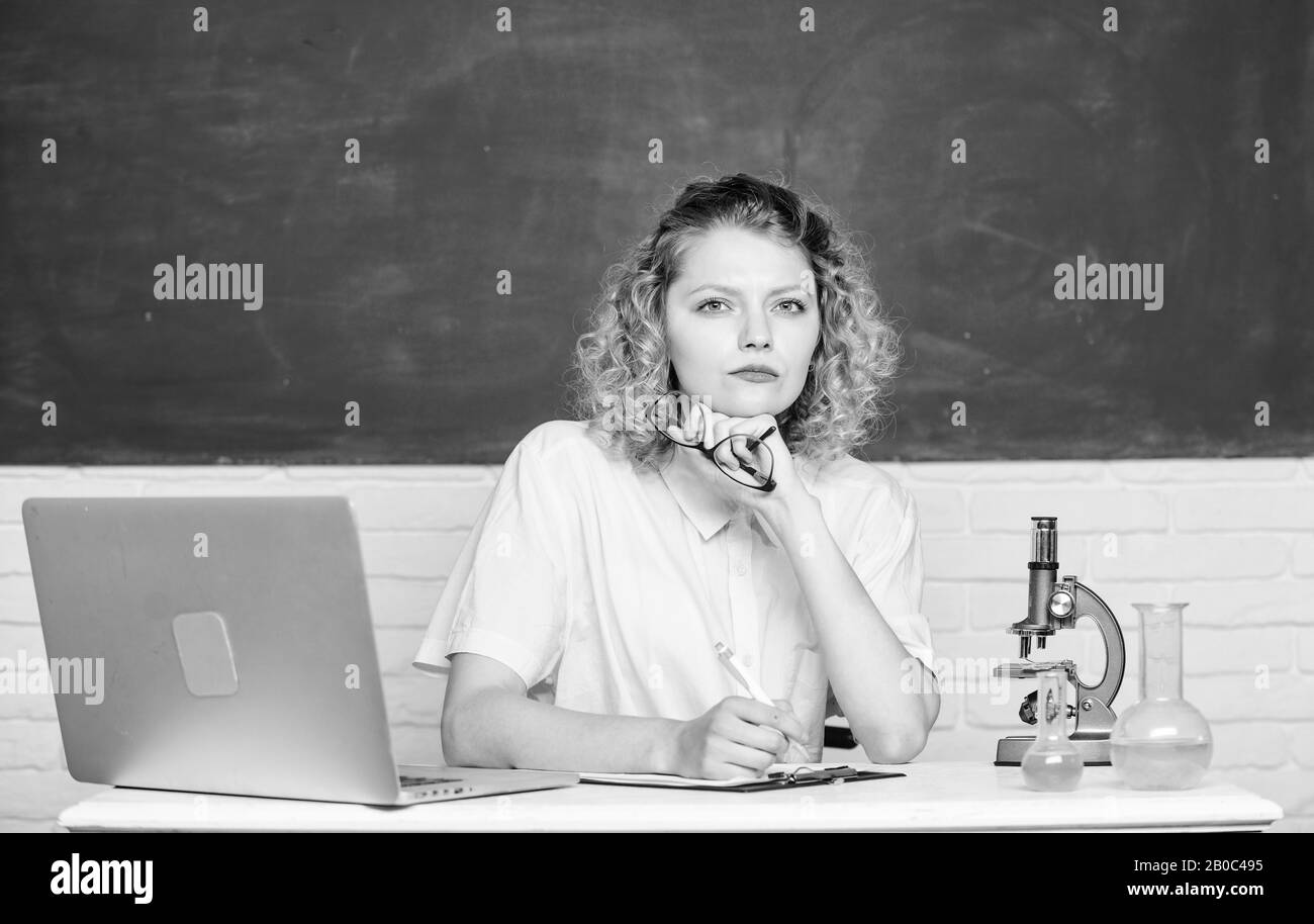 Scientific research. Student girl with laptop and microscope. Study ...
