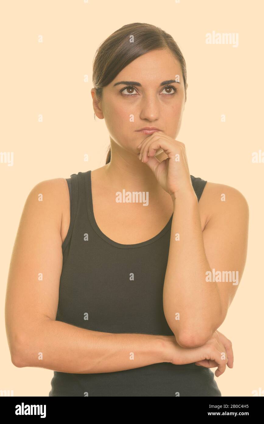 Close up of beautiful woman thinking while looking up Stock Photo - Alamy