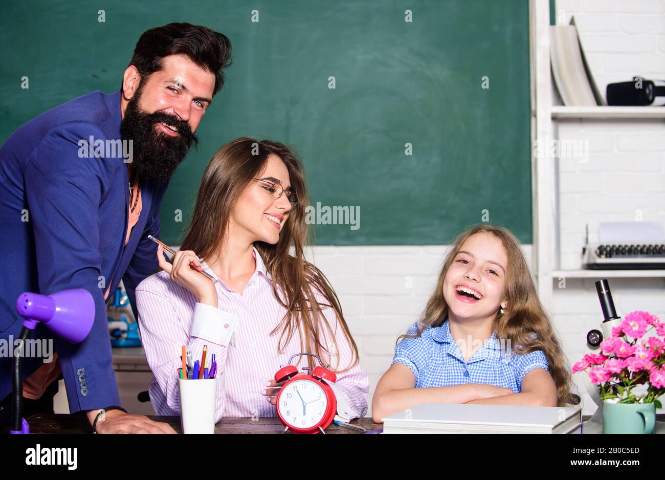 Tutor for excellence. Extra classes. Gifted child. Little girl studying ...