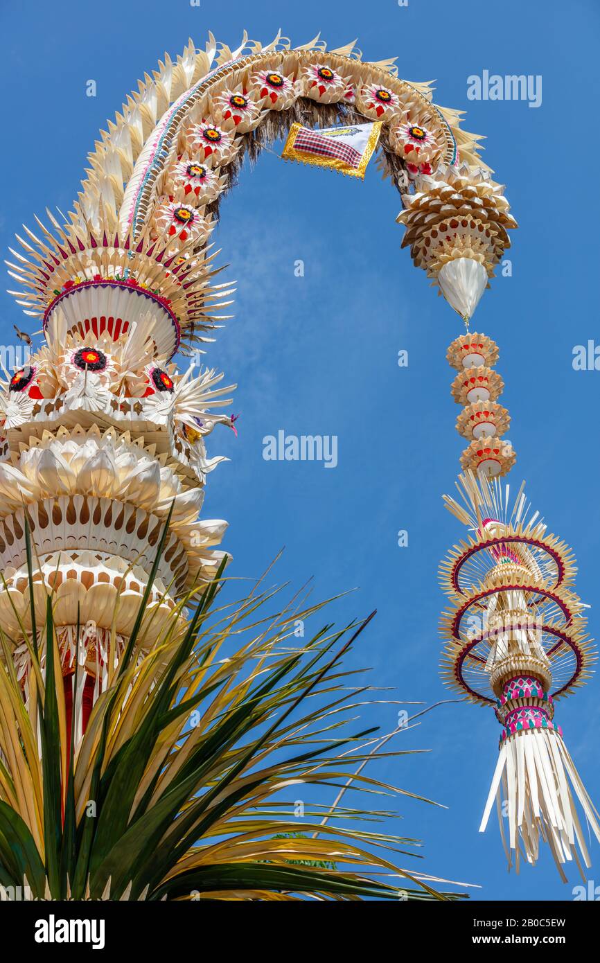 Penjor - street thatched bamboo poles for Galungan celebration of ...