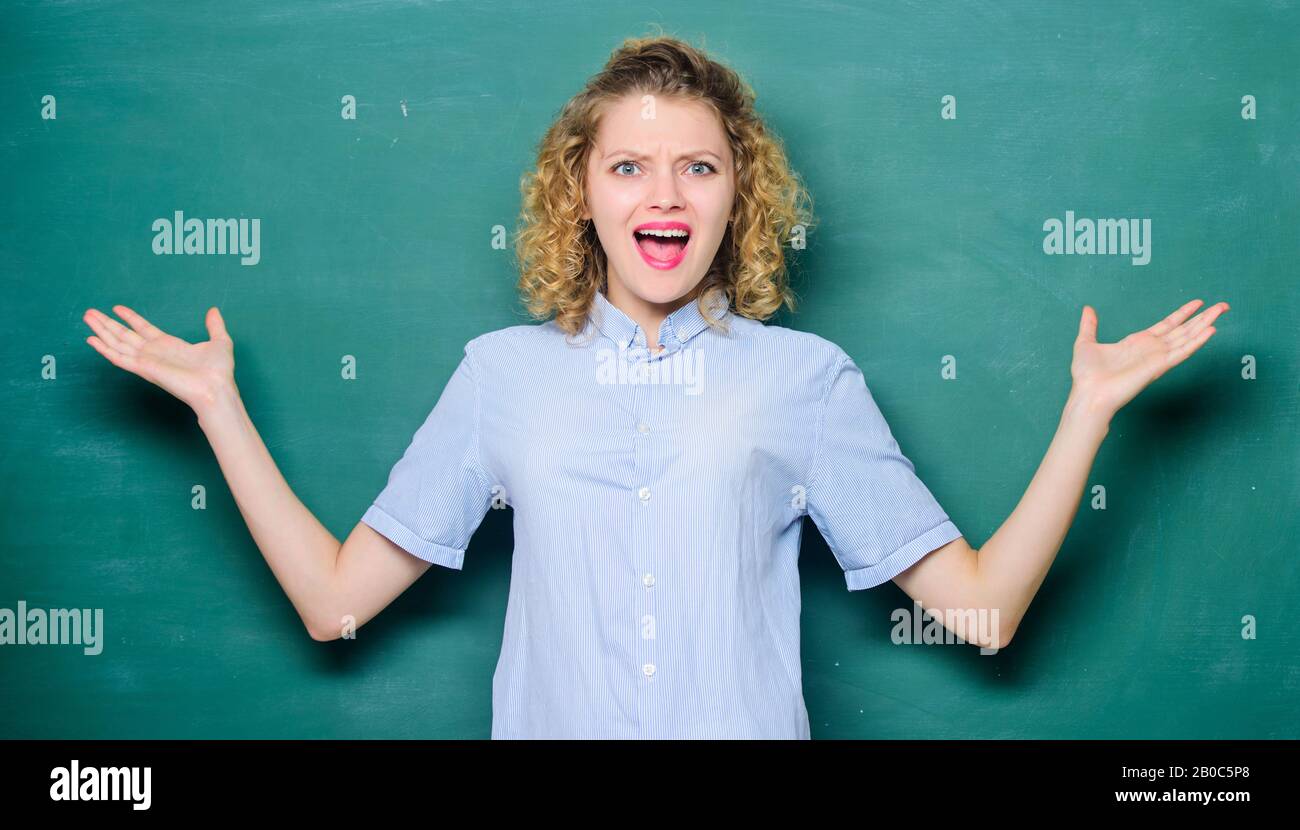 back to school. woman likes studying. confused student at blackboard ...