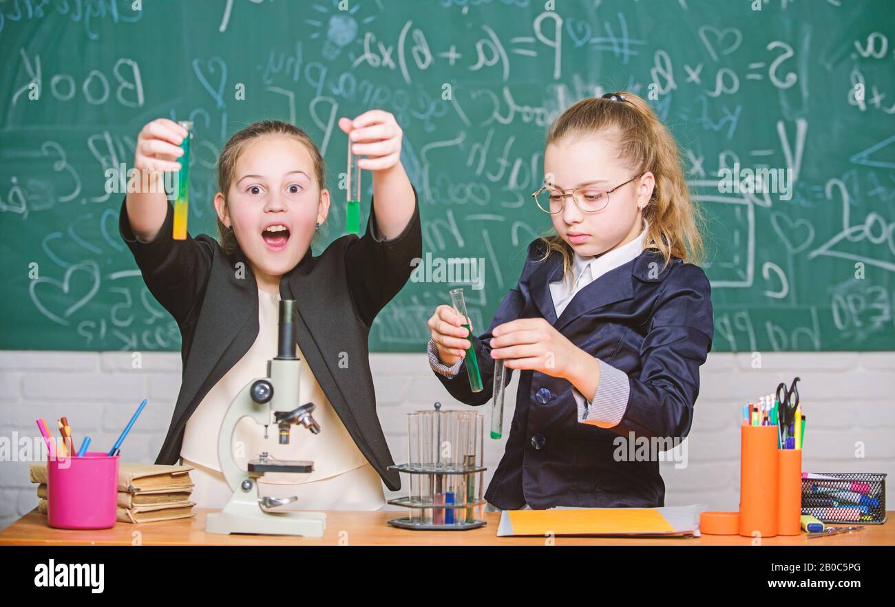 School project investigation. School experiment. Girls school uniform ...