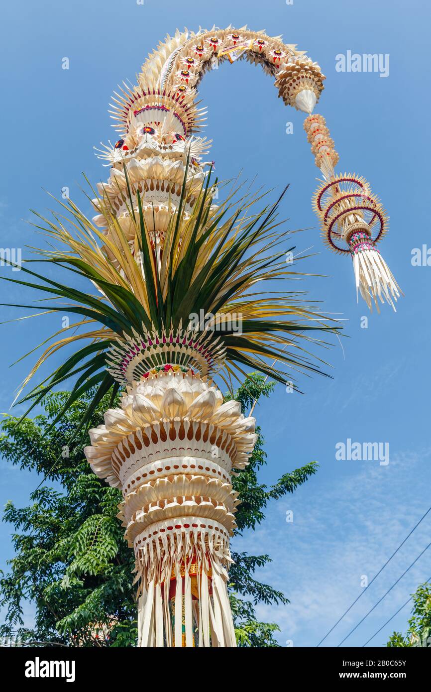 Penjor - street thatched bamboo poles for Galungan celebration of ...