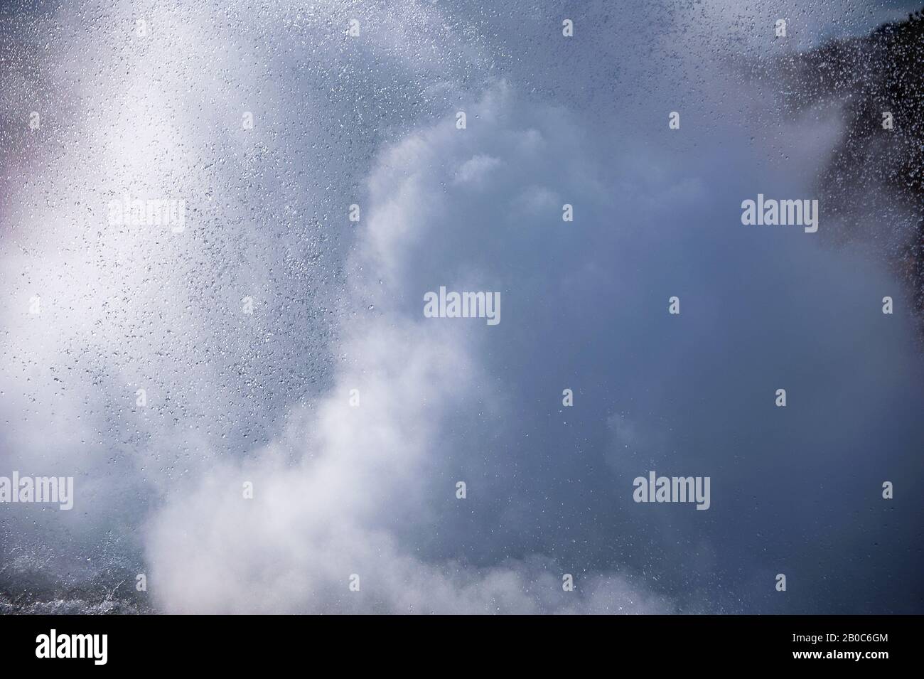 Strokkur Geyser close up eruption. Water droplets and spray Stock Photo ...